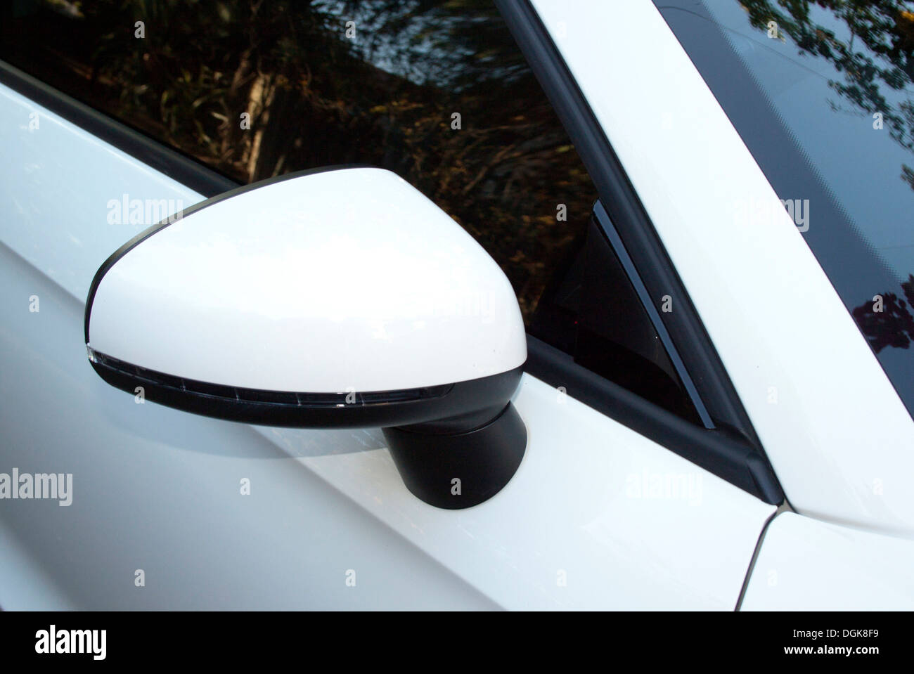 Abstract closeup side view of rear-view mirror and vehicle Stock Photo ...