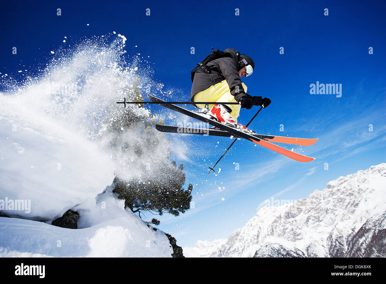 Male skier mid air on mountain Stock Photo - Alamy
