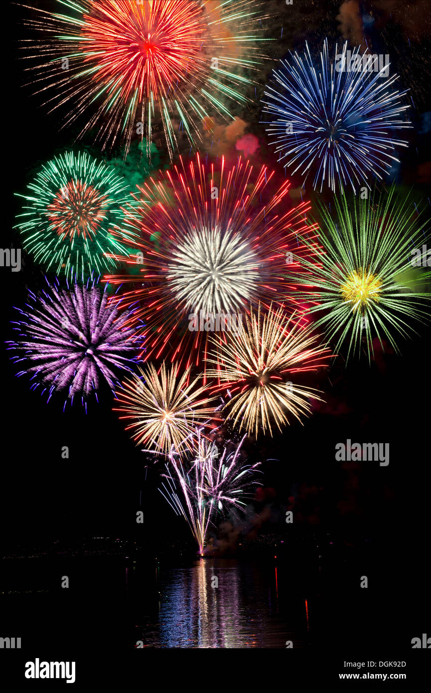 Fireworks exploding in night sky Stock Photo - Alamy