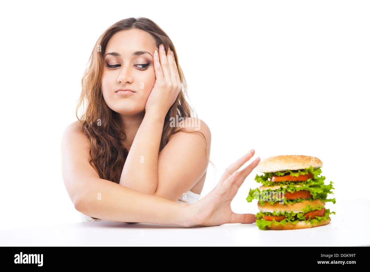 Happy Young Woman Eating big yummy Burger isolated Stock Photo - Alamy