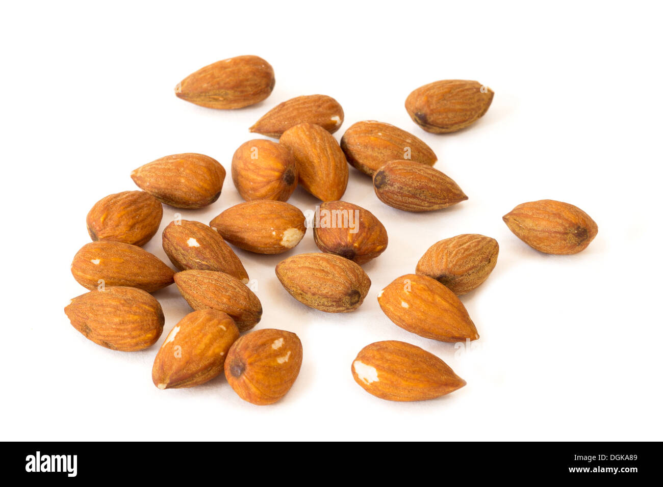 Closeup of several almond seeds, isolated on white background Stock ...