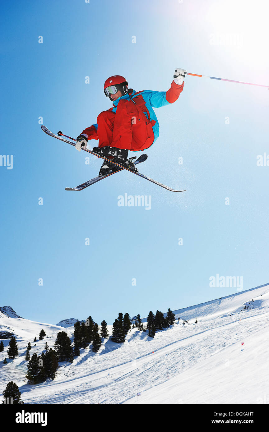 Skier jumping in midair Stock Photo - Alamy