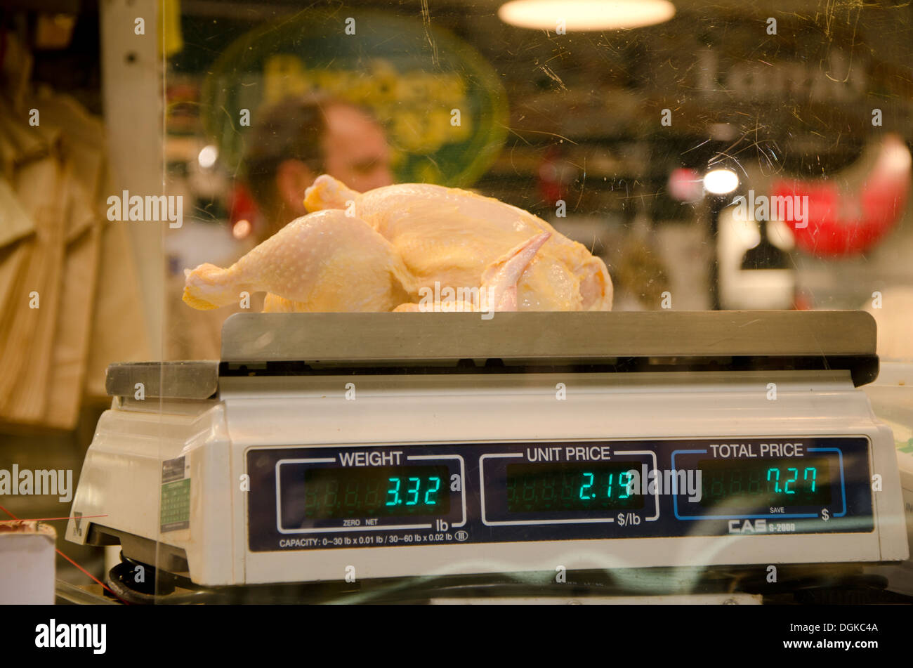Raw chicken body on Weight Scale in indoor market, Pennsylvania, United ...