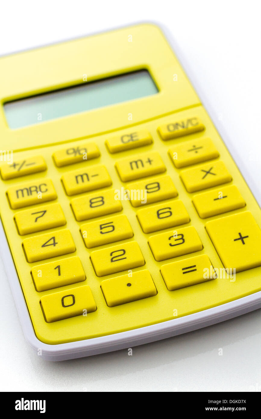 Simple yellow calculator on a white background Stock Photo - Alamy