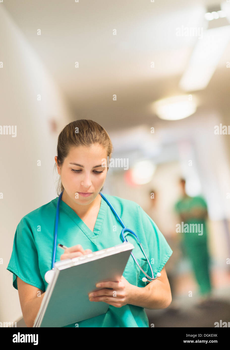 Female doctor in hospital hallway Stock Photo - Alamy