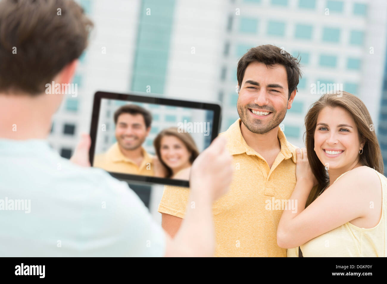Man taking picture tablet outdoors hi-res stock photography and images ...