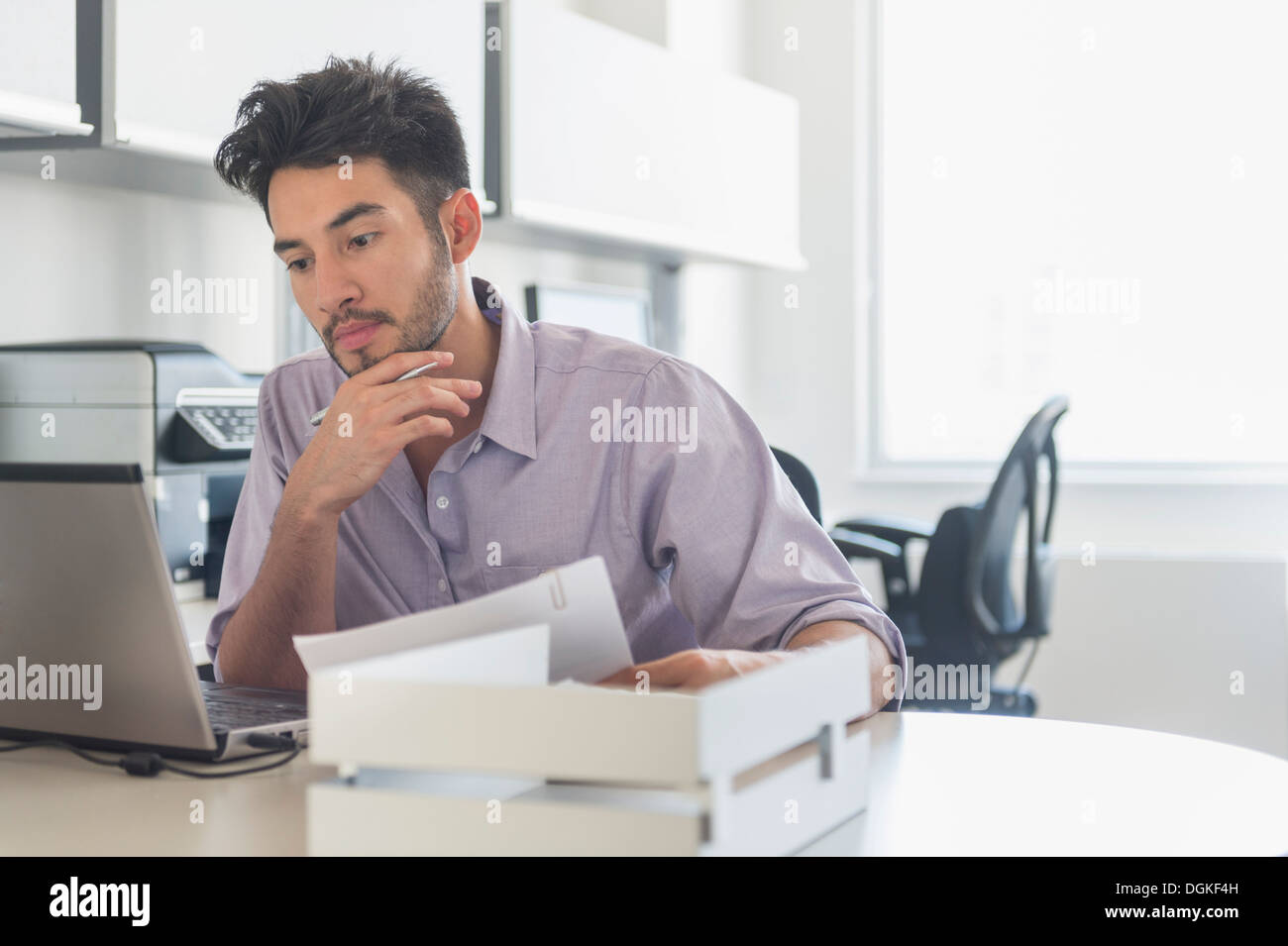 Office worker busy working hi-res stock photography and images - Alamy