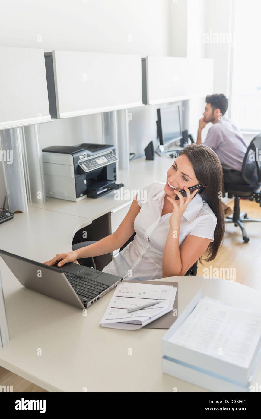Multi tasking and woman hi-res stock photography and images - Alamy