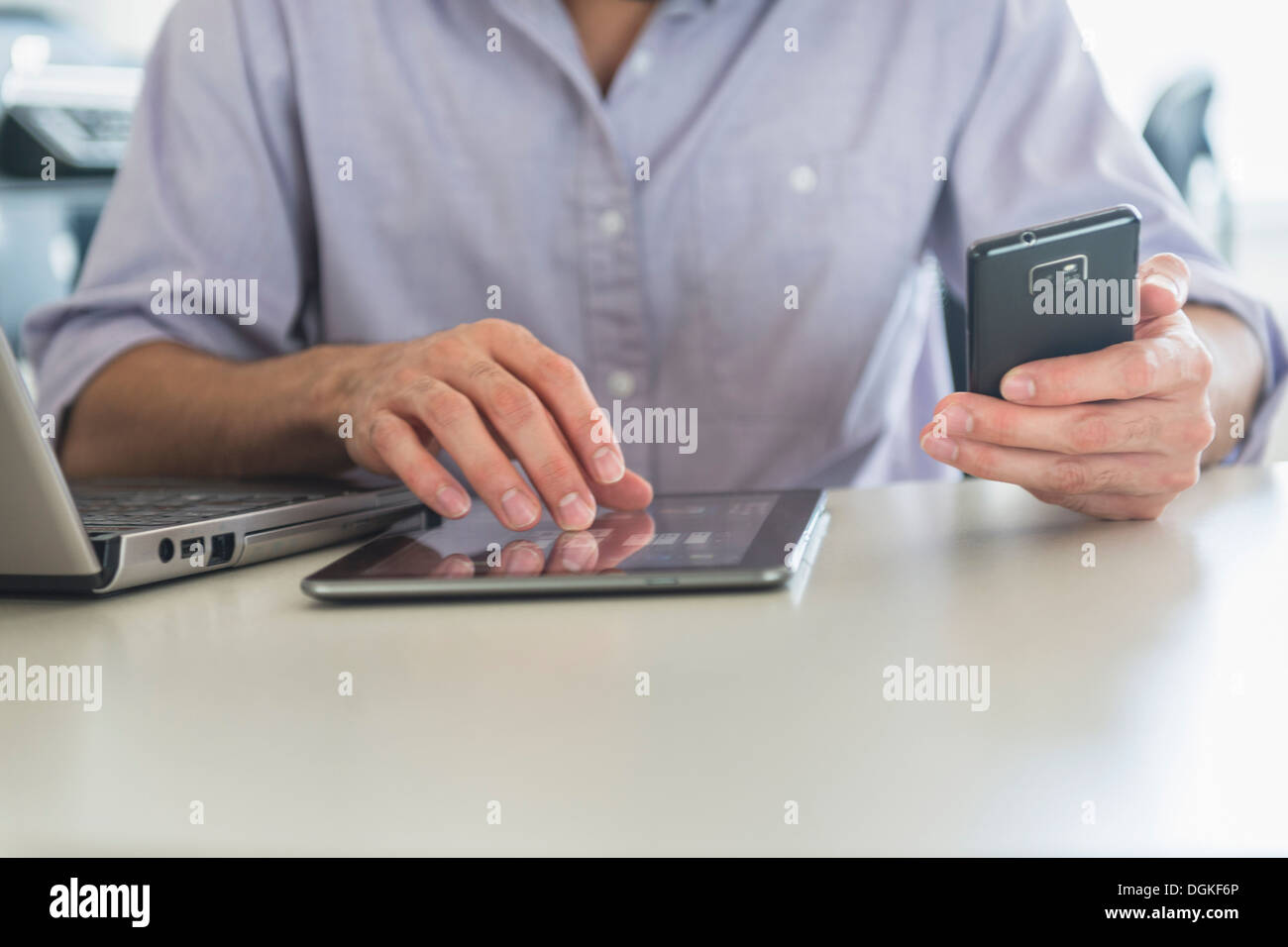 Man using technology in office Stock Photo - Alamy