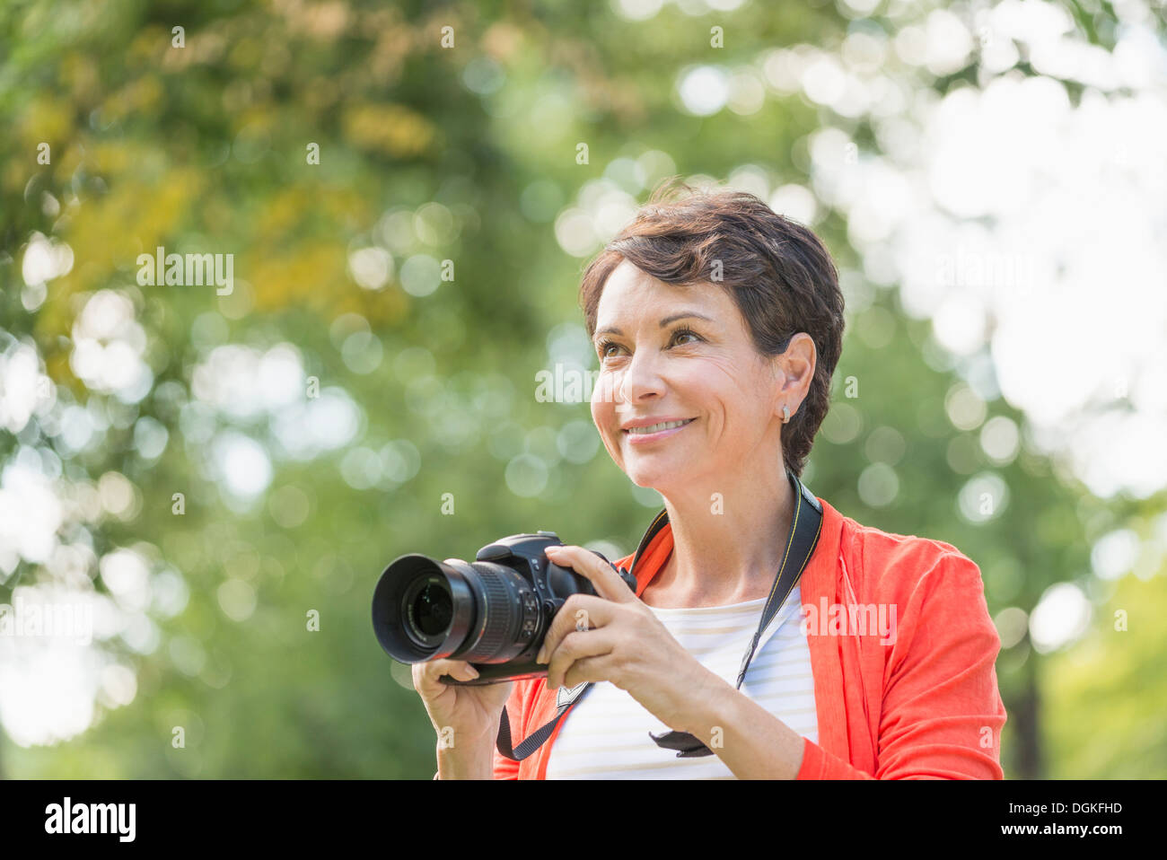 Creative woman looking camera in hi-res stock photography and images ...