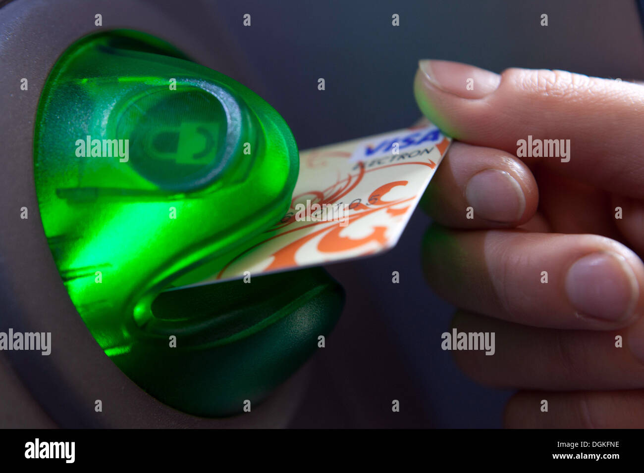 Insert credit card into an ATM machine cash bank teller Stock Photo - Alamy