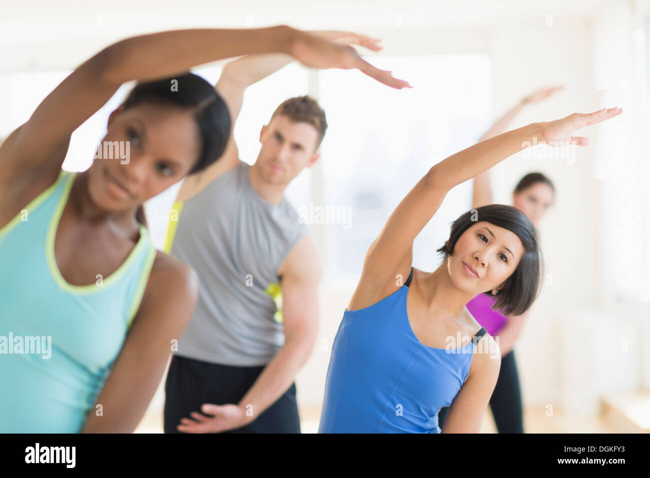 People stretching in gym Stock Photo - Alamy