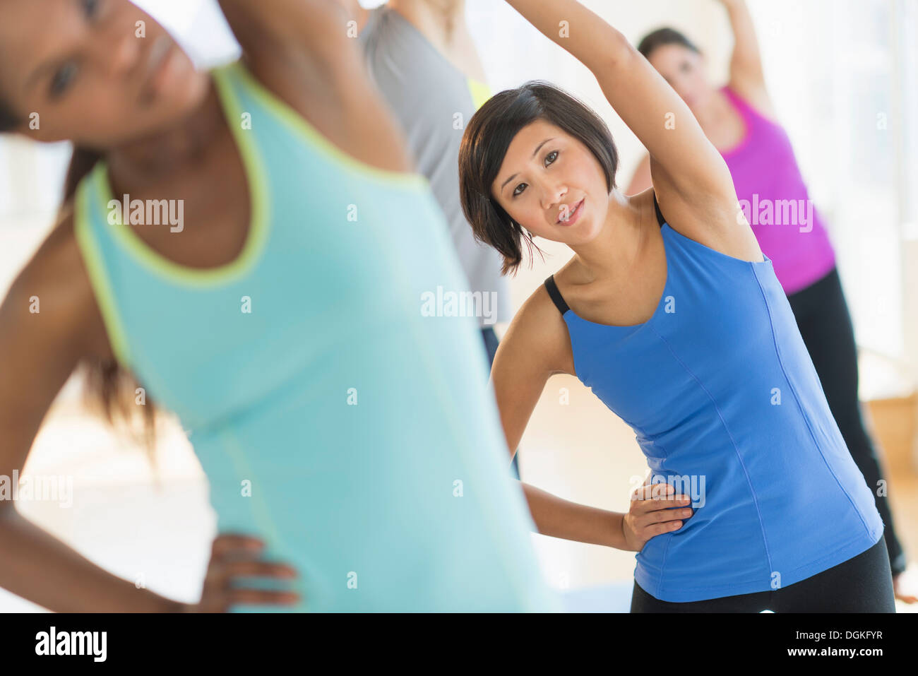People stretching in gym Stock Photo - Alamy