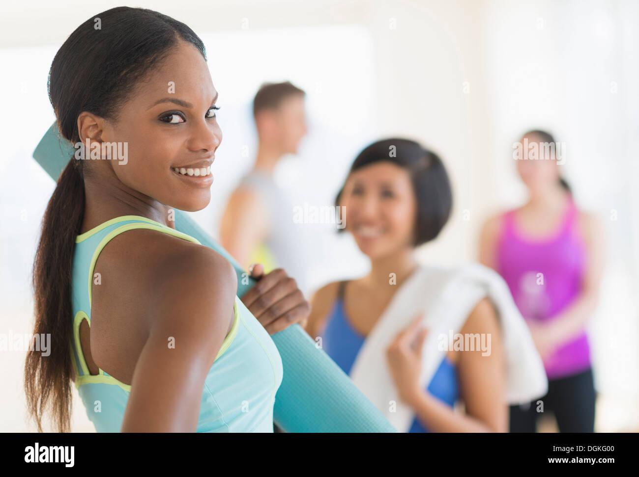 People socializing in gym Stock Photo - Alamy