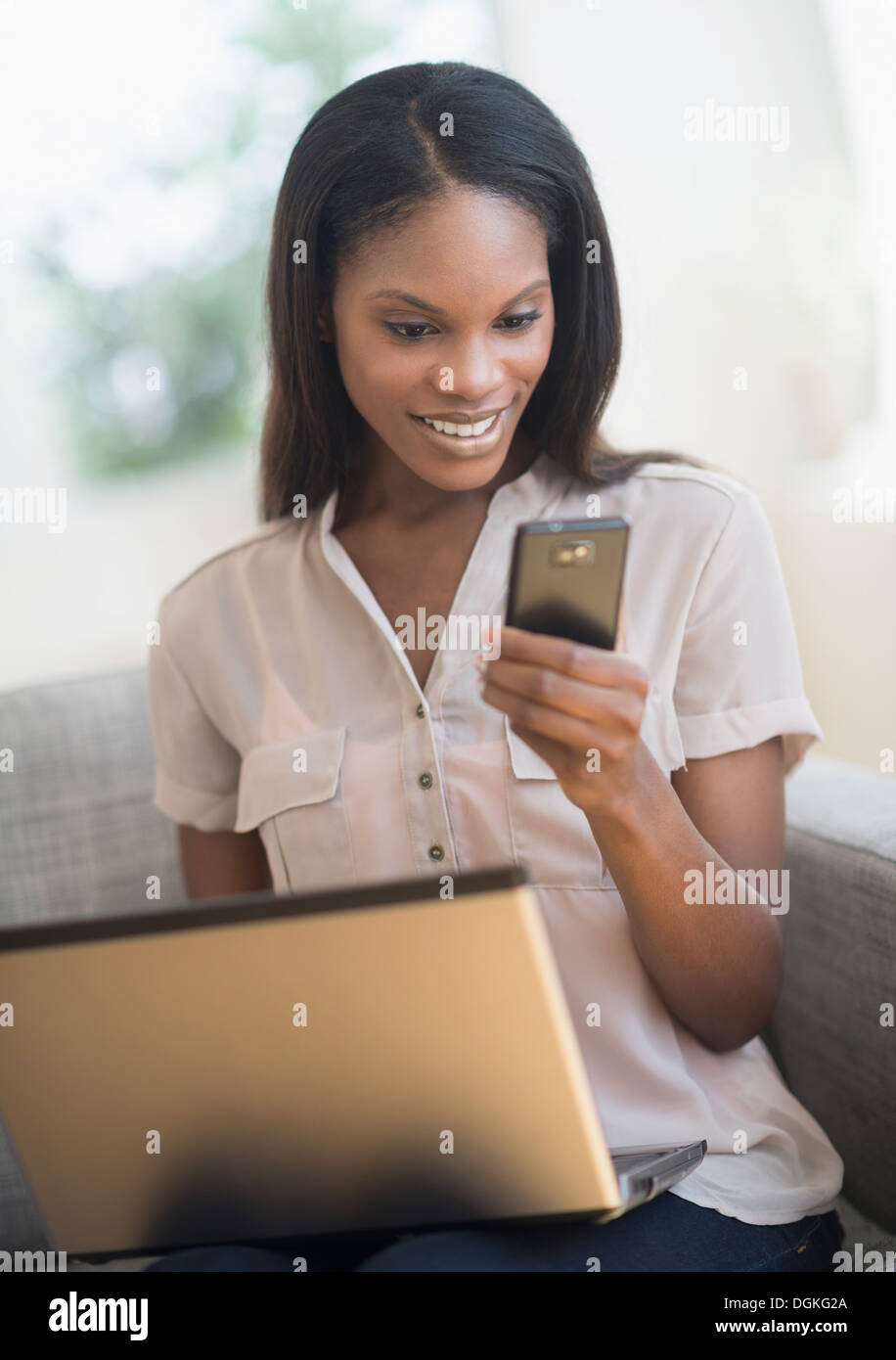 Mobile with laptop hi-res stock photography and images - Alamy