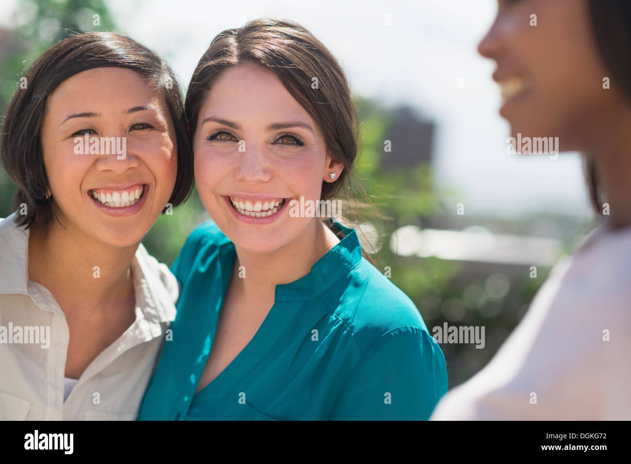 Women laughing outside Stock Photo - Alamy