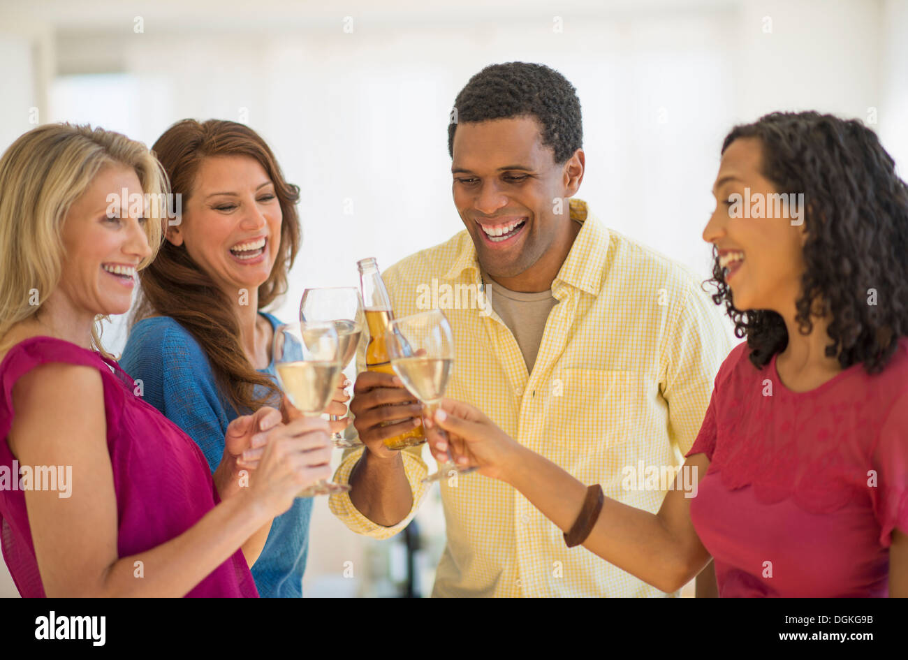 Friends making toast at party Stock Photo - Alamy