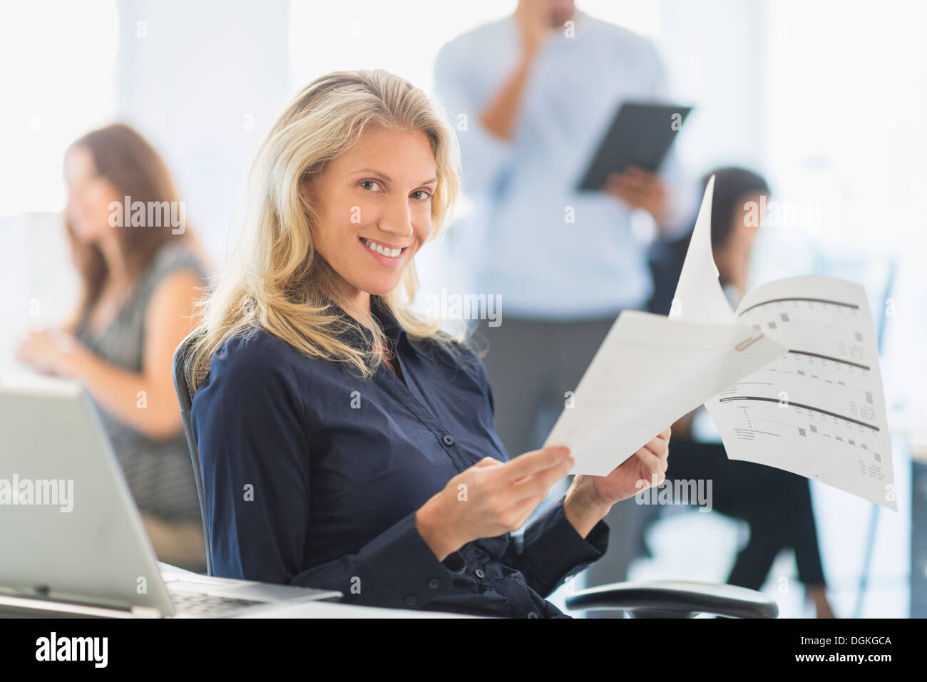 Standing communication smiling holding document hi-res stock ...
