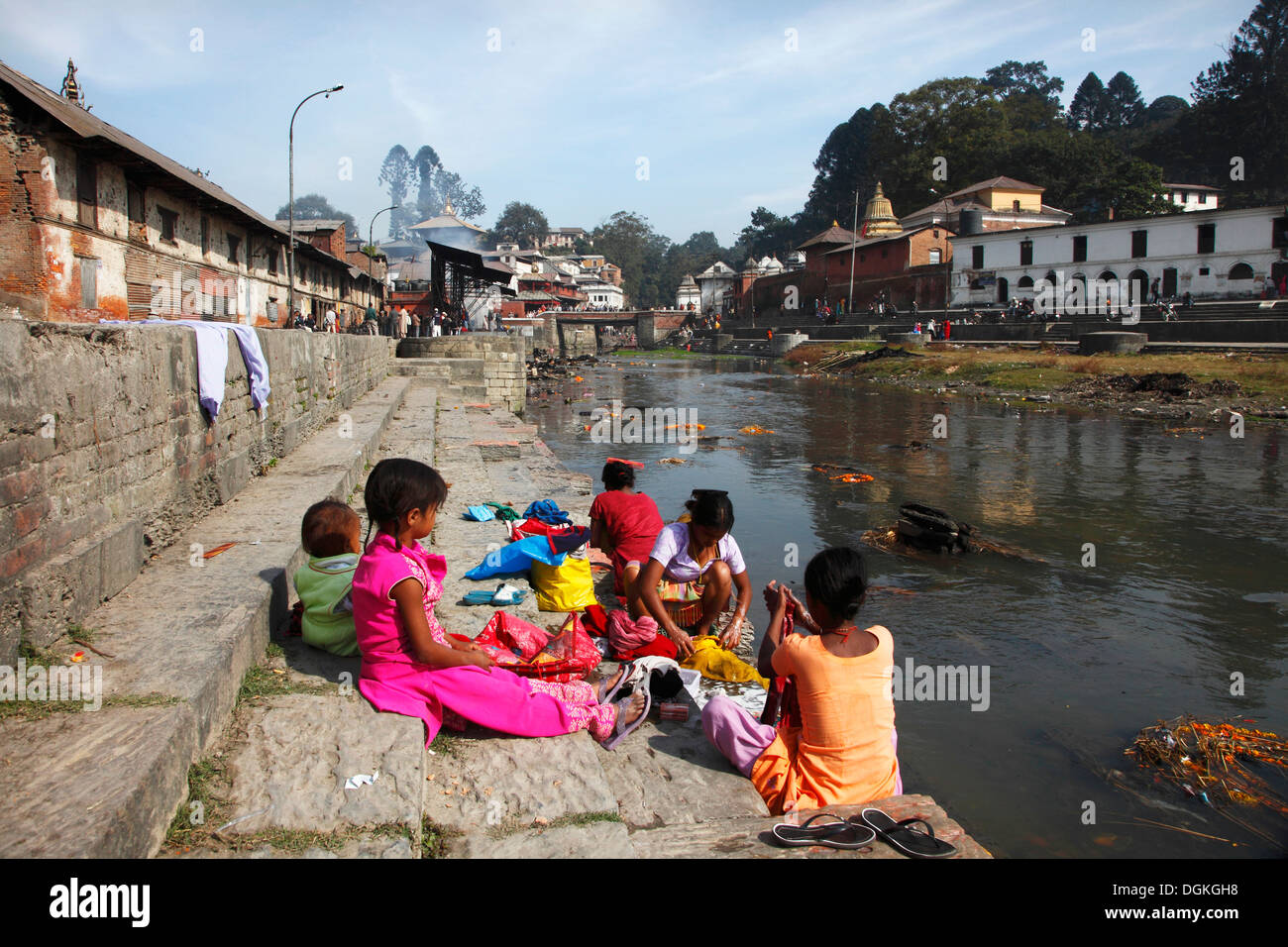 Child washing in river hi-res stock photography and images - Alamy