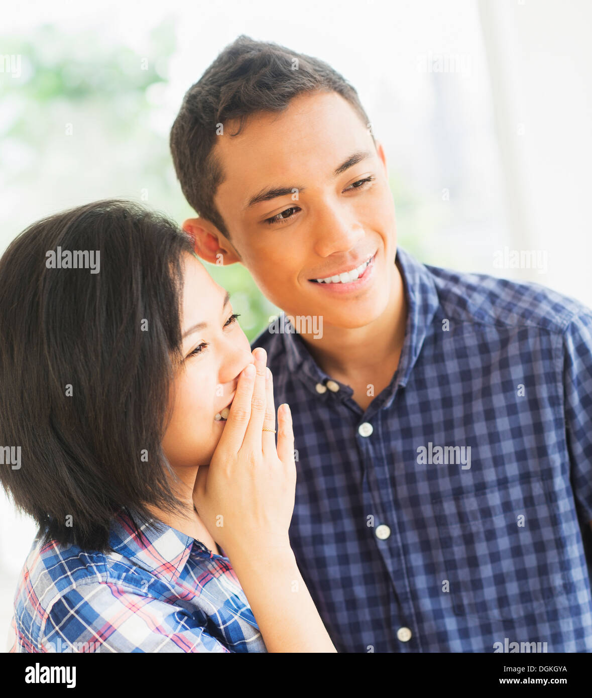 Smiling young couple man woman hi-res stock photography and images - Alamy