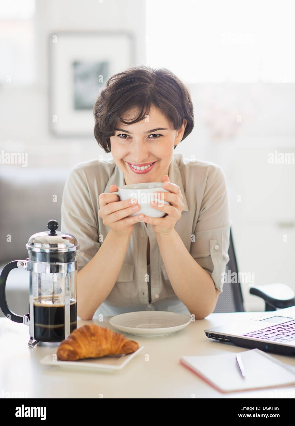 Woman taking cup coffee home hi-res stock photography and images - Alamy