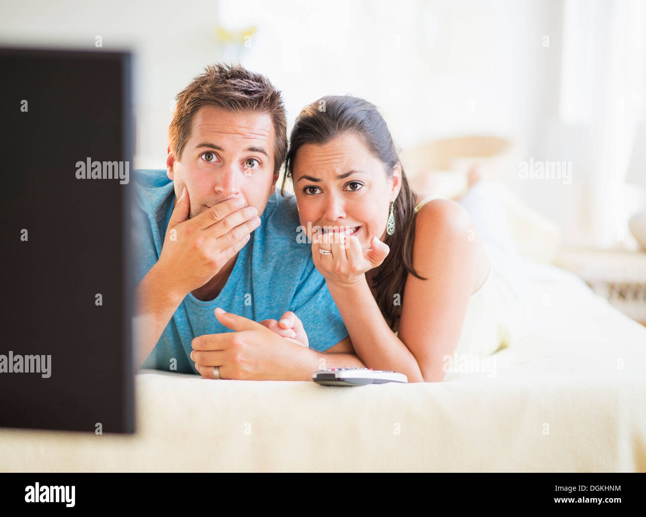 People watching tv serious hi-res stock photography and images - Alamy