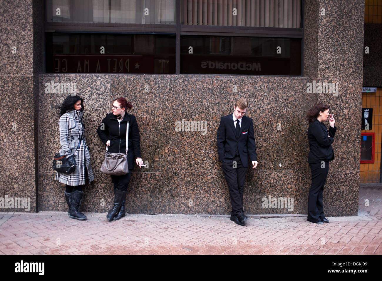 People having a cigarette break Stock Photo - Alamy