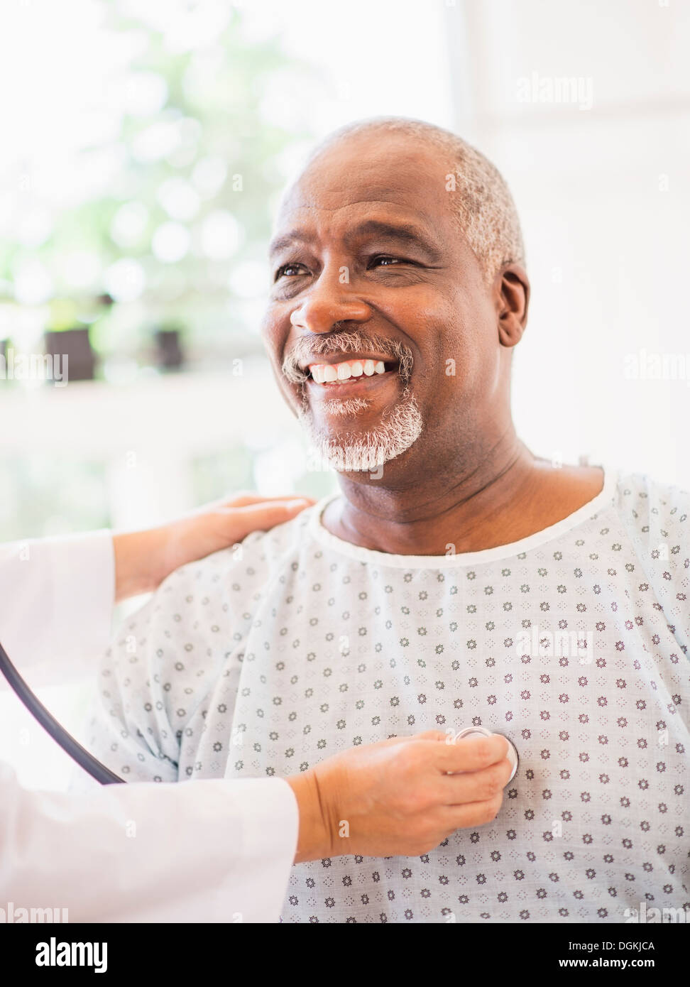 African doctor patient head in hand hi-res stock photography and images ...