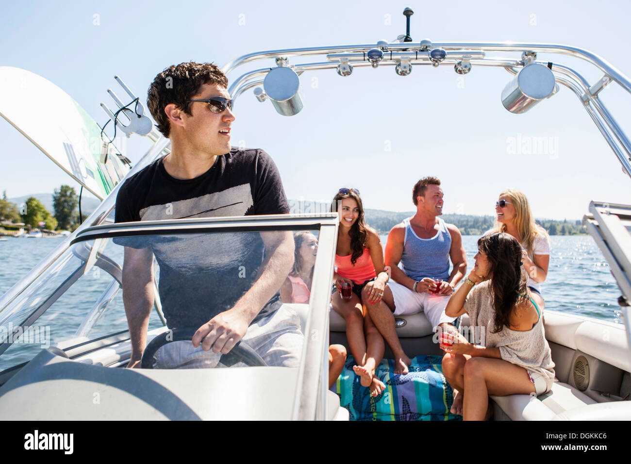 USA, Washington, Bellingham, Young people enjoying speedboat ride Stock ...