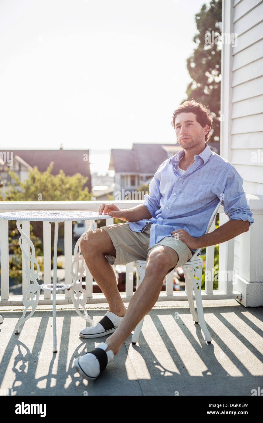 Man sitting chair hi-res stock photography and images - Alamy