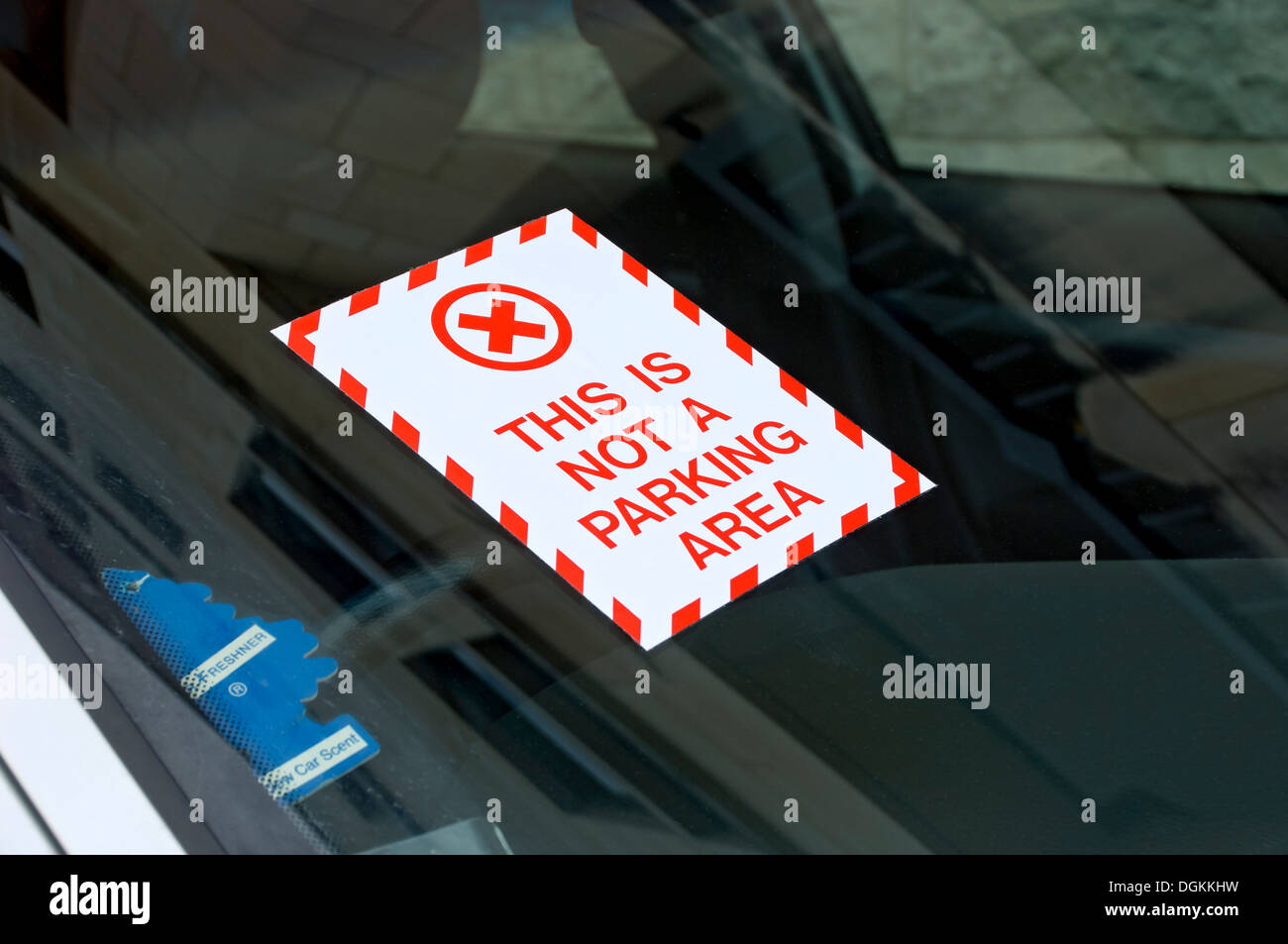 This is not a parking area sign on car windscreen Stock Photo - Alamy