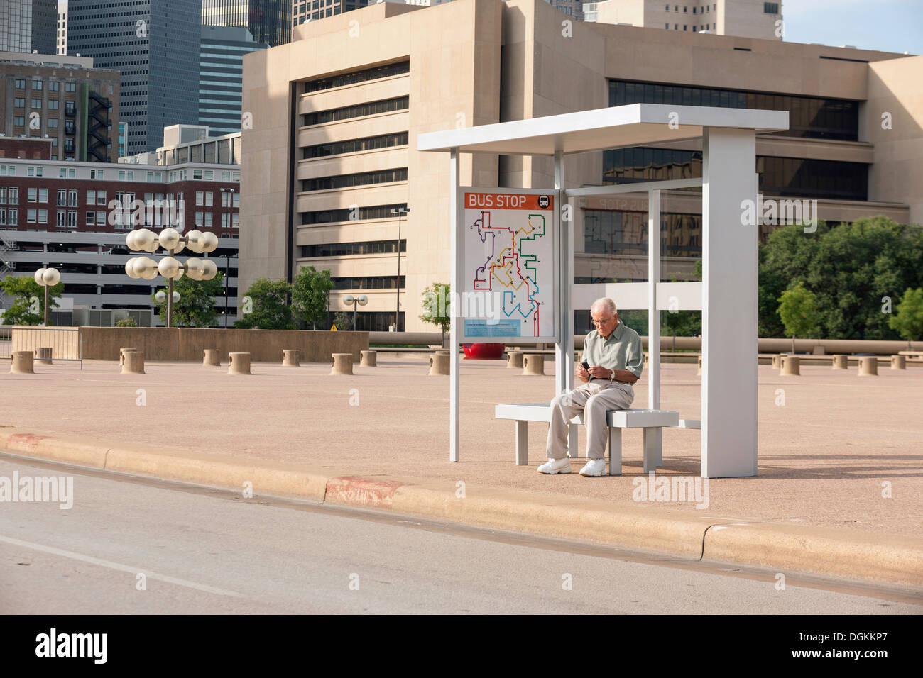 Senior man at bus stop hi-res stock photography and images - Alamy