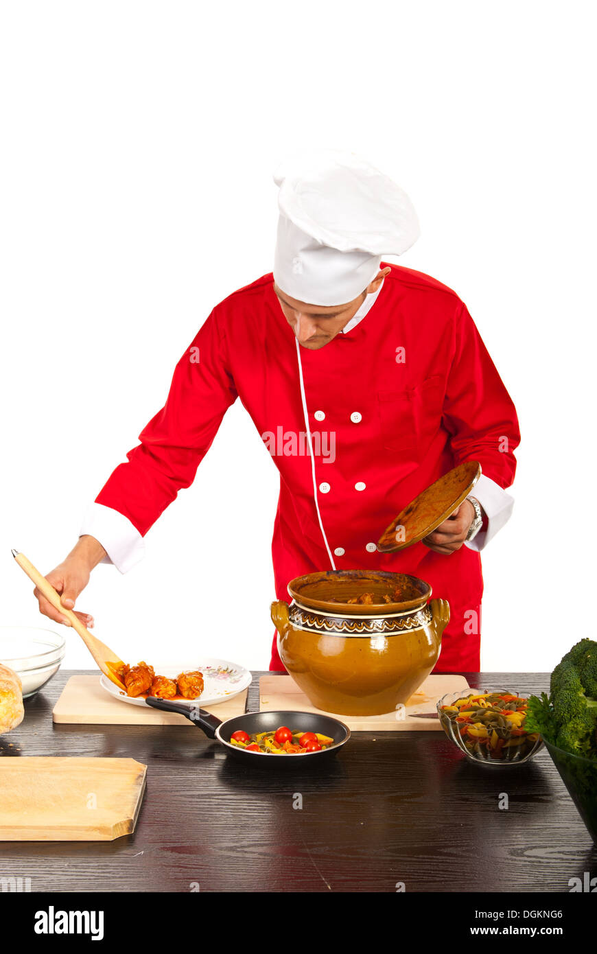 Chef garnish plate with food in kitchen Stock Photo - Alamy