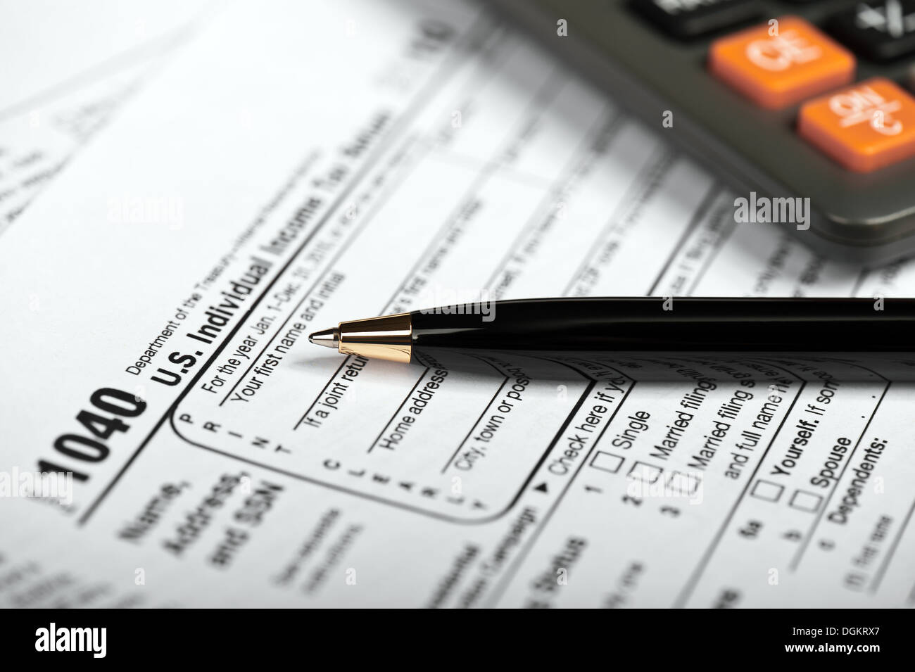 A Tax Form, Pen and Calculator Stock Photo - Alamy