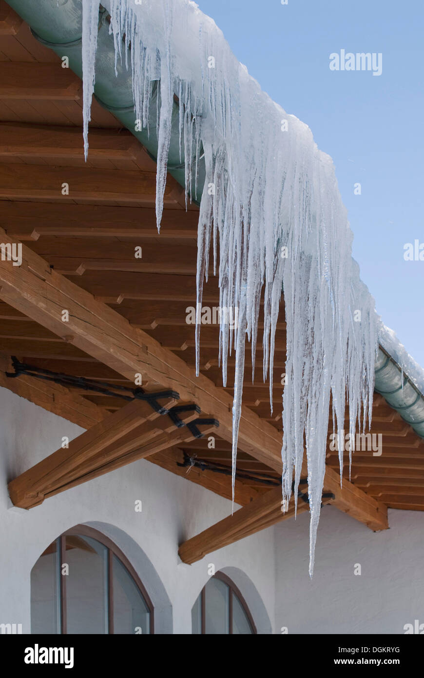 Big icicles hanging over the gutter of a mountain lodge, Bavaria Stock ...