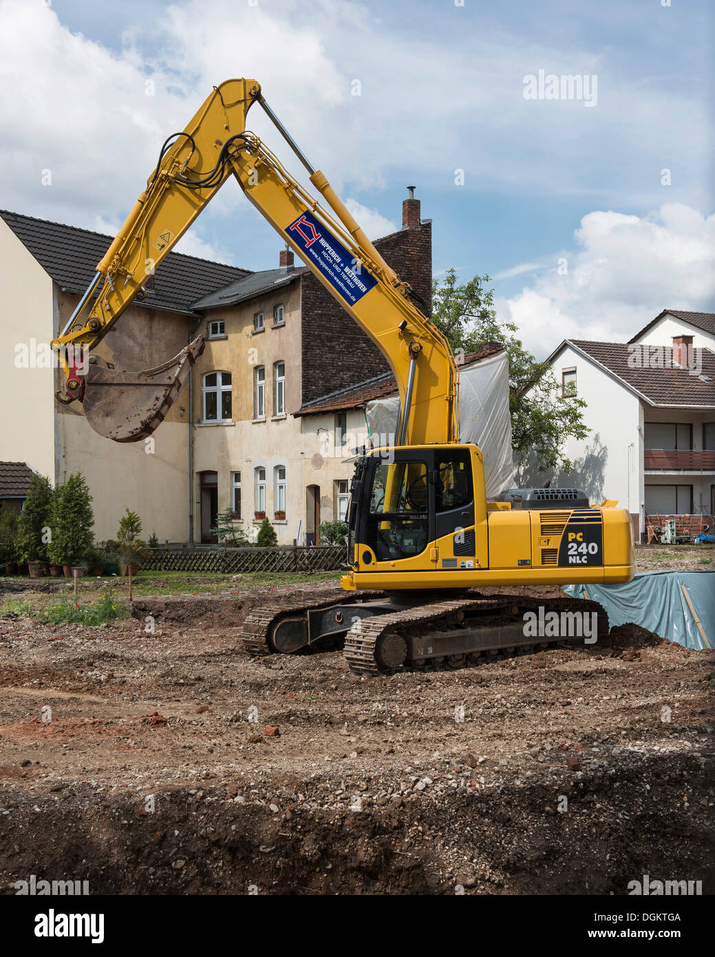 Construction, backhoe excavating land in Bonn, North Rhine-Westphalia ...