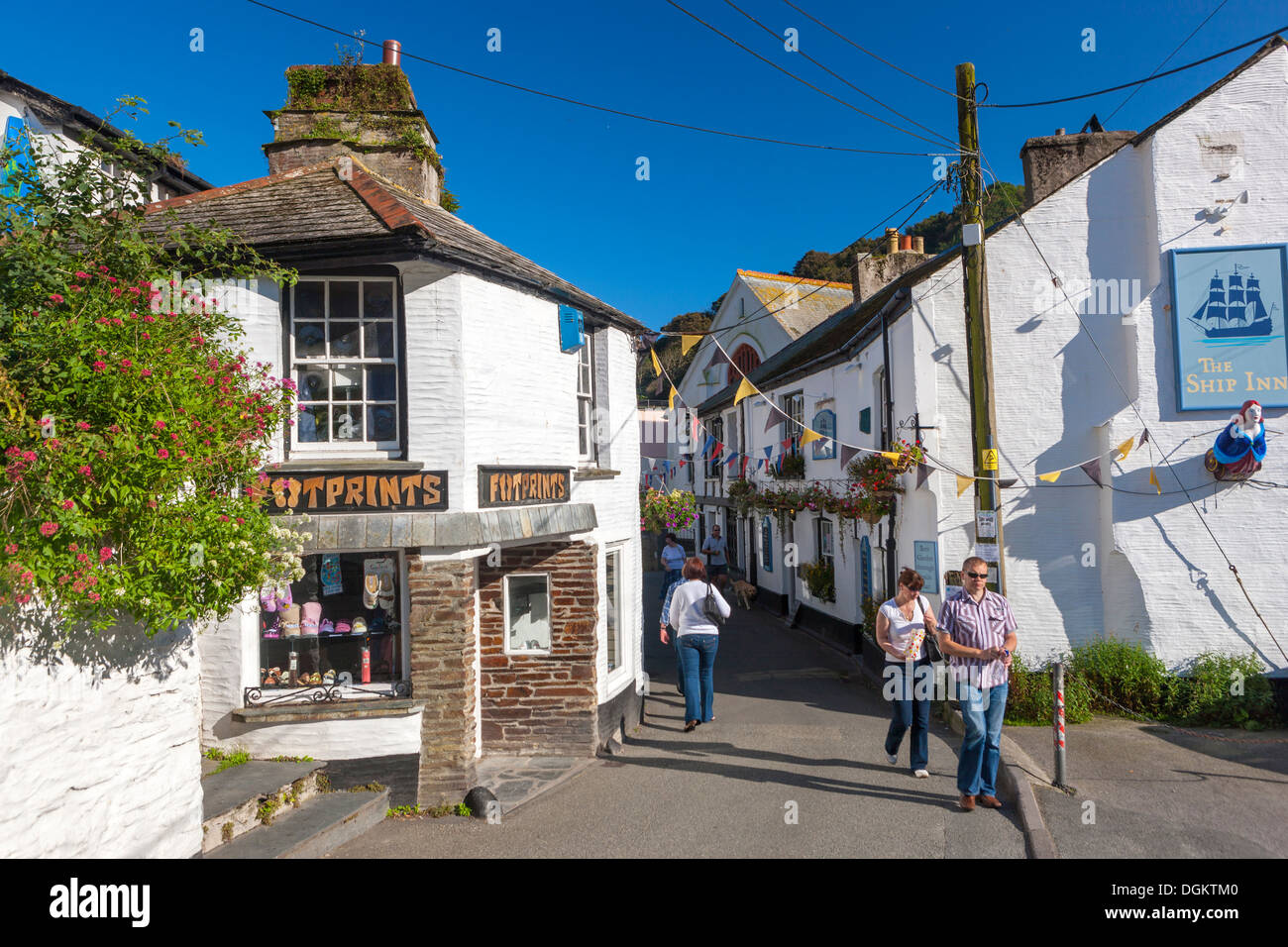 Main pedestrianised street in the coastal fishing village of Polperro ...