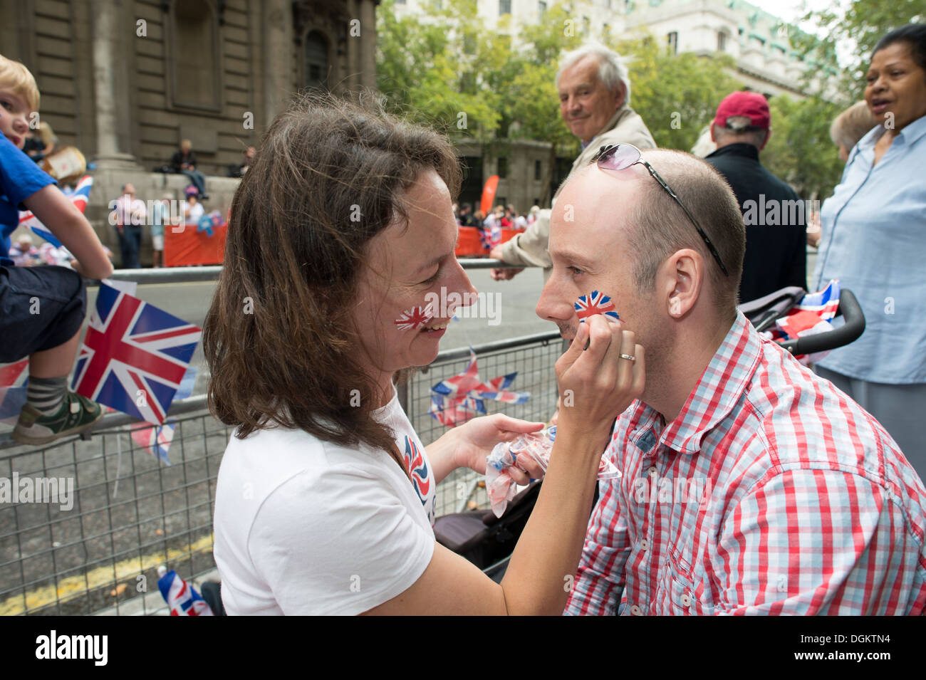 Preparing to watch and cheer the Olympian Victory Parade along The ...