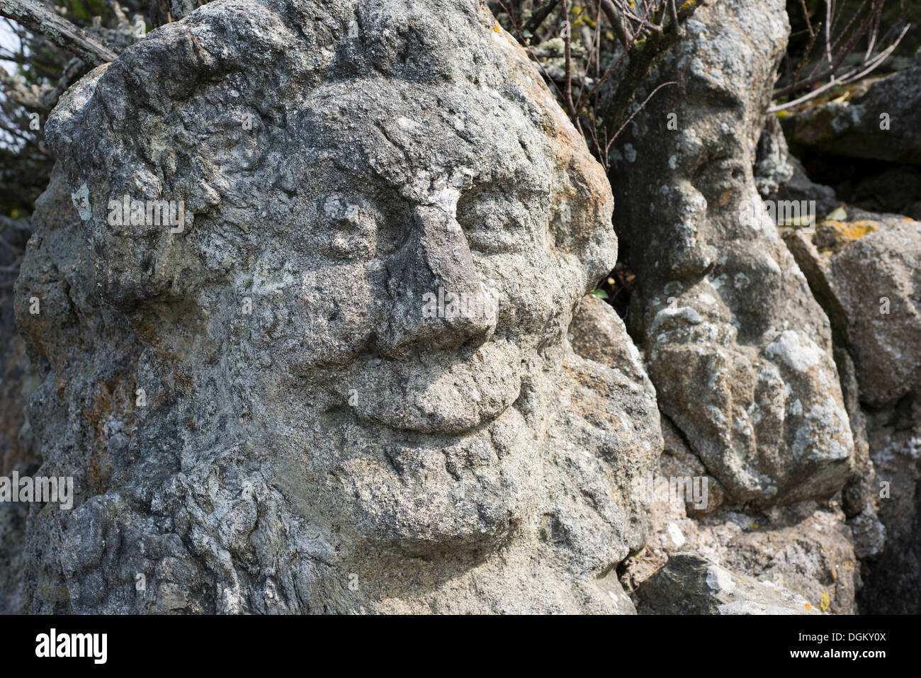 Stone head in the garden of sculpted rocks by Abbé Fouré, Rothéneuf ...