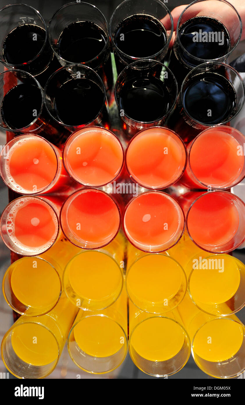 Glasses with drinks in the colours of the German flag Stock Photo - Alamy