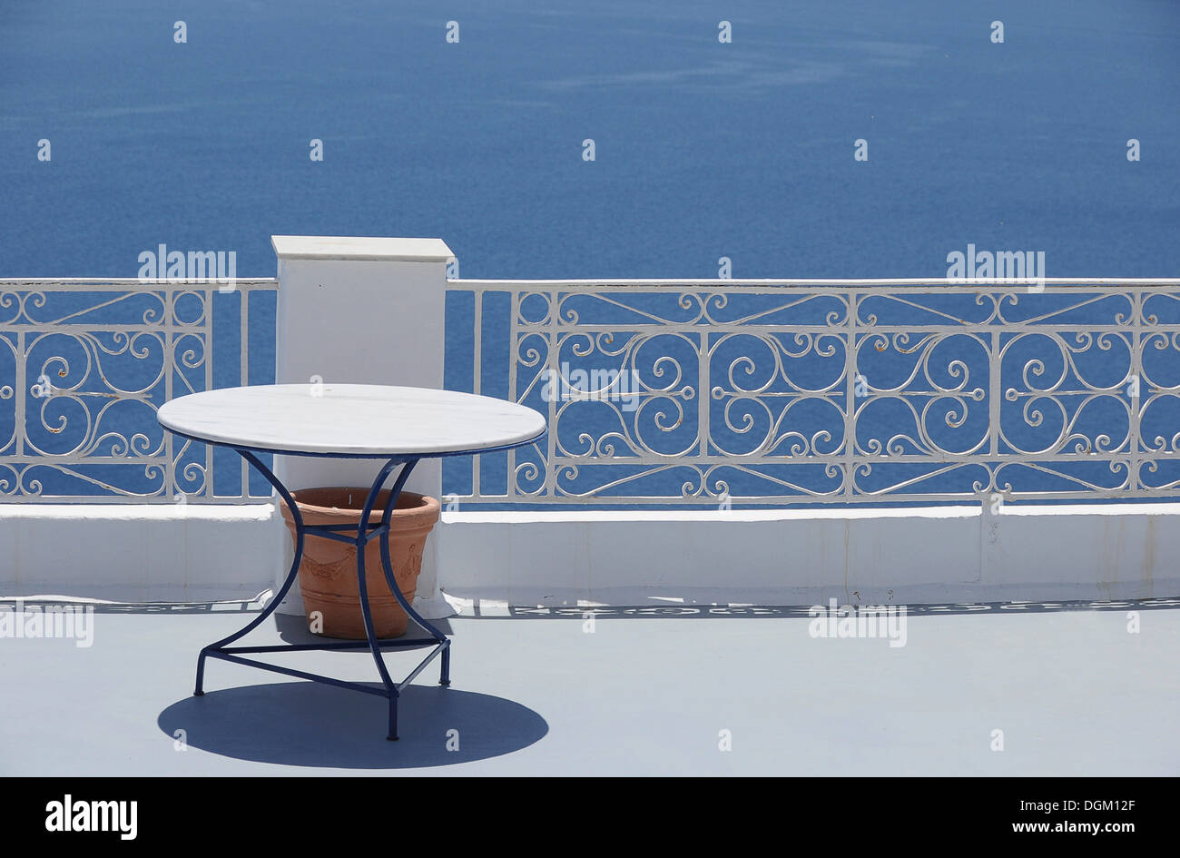 Round table, railing, ocean, Fira, Santorini, Greece, Europe ...