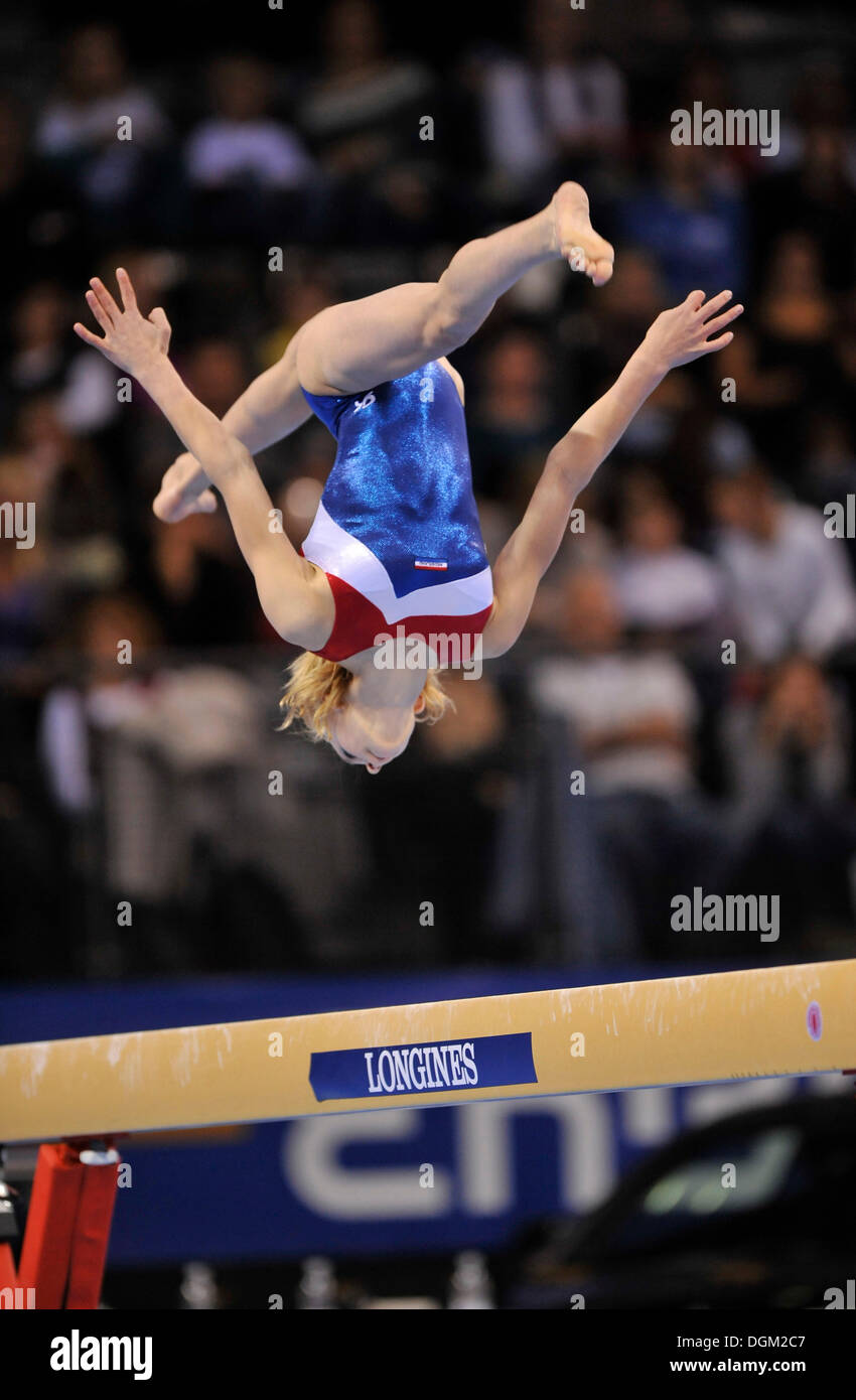 Gymnast jumping on beam hi-res stock photography and images - Alamy