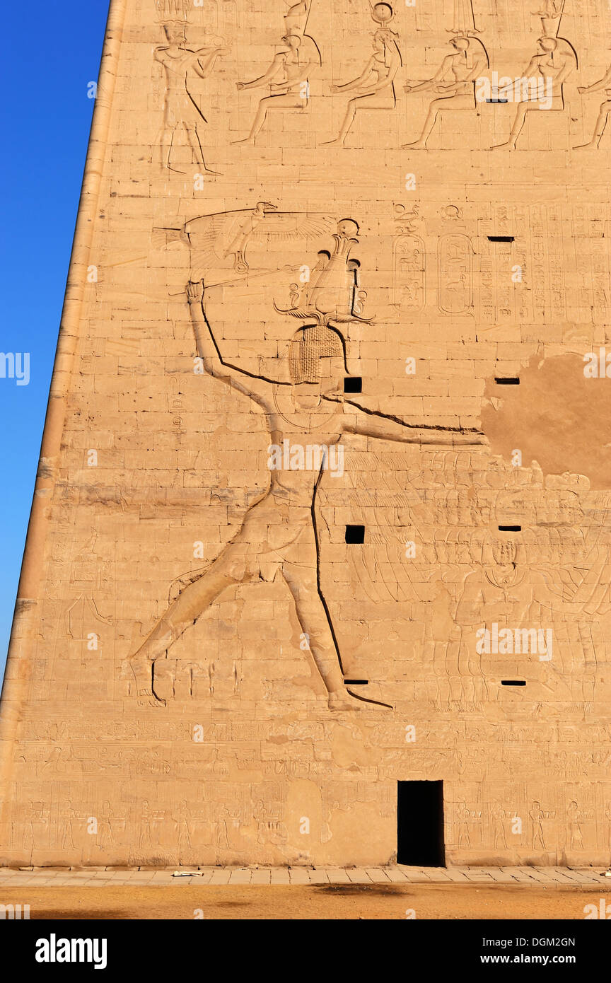 Wall relief on Entrance Pylon, Temple of Horus at Edfu, Upper Egypt ...