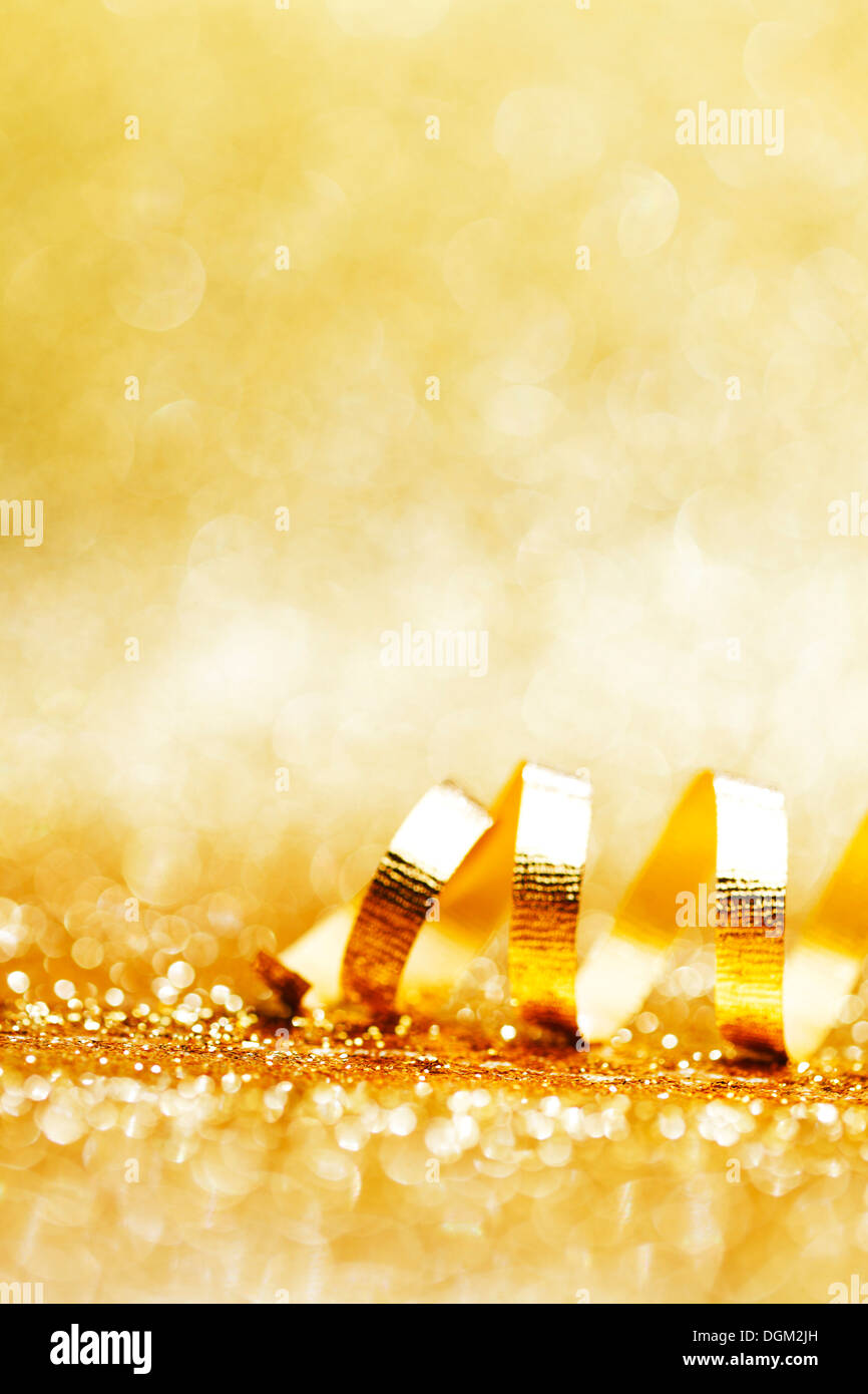 Golden ribbon decoration on shiny background Stock Photo - Alamy