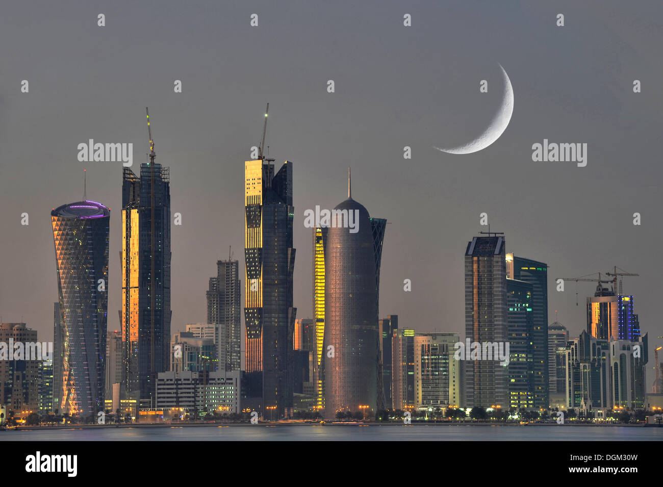 Twilight shot, skyline of Doha, Tornado Tower, Navigation Tower, Peace ...