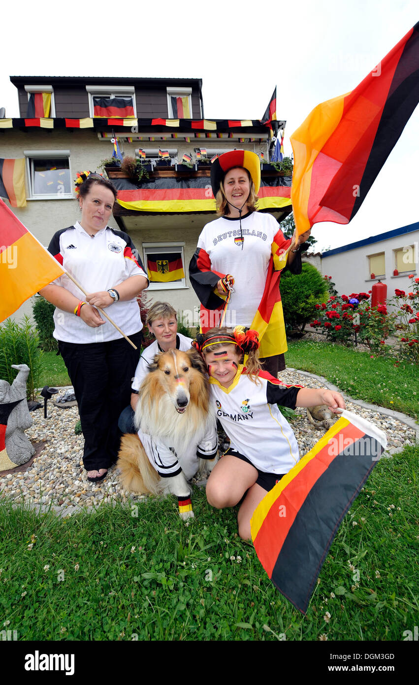 Fans of the German national team in German team jerseys and with ...