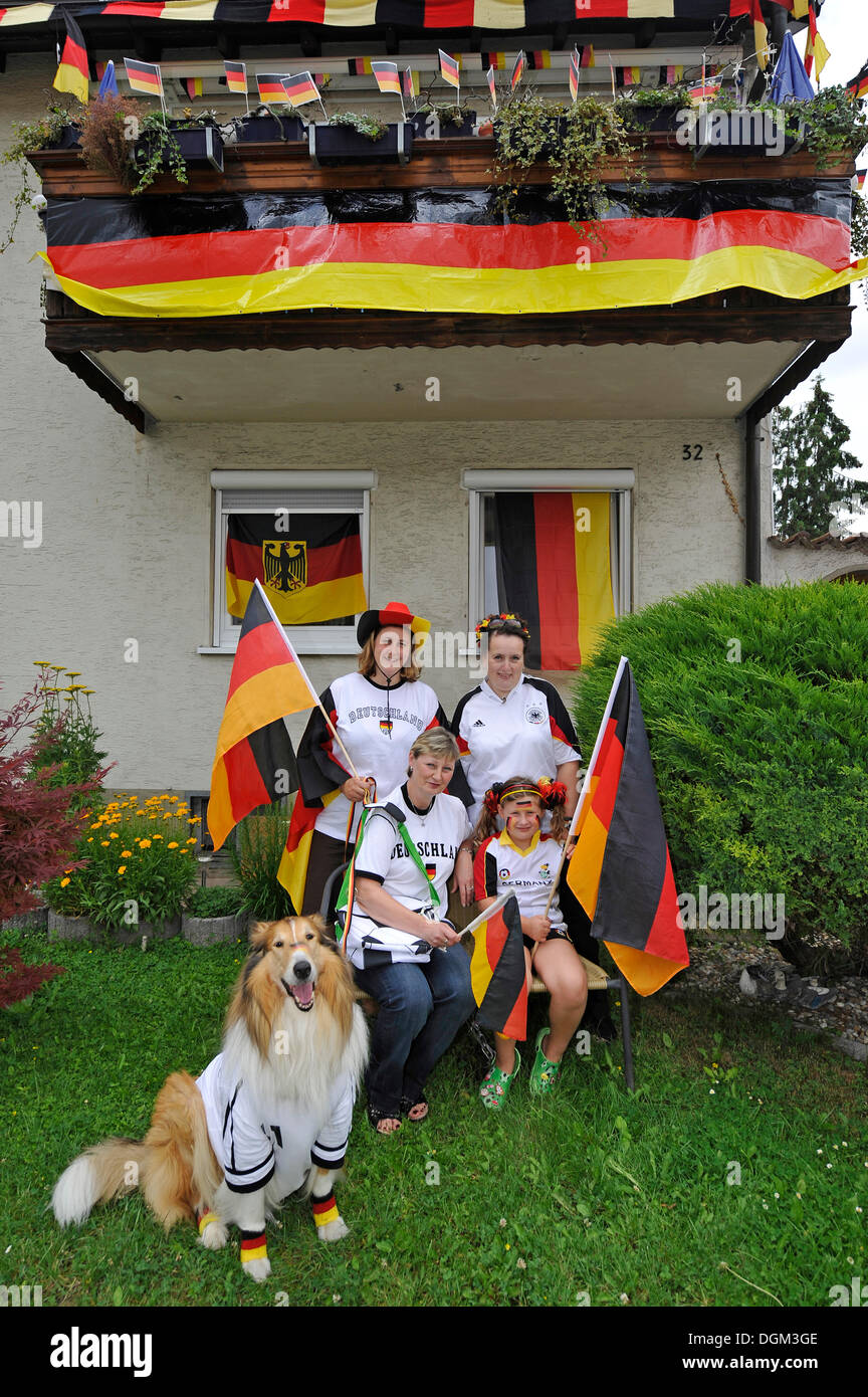 Fans of the German national team in German team jerseys and with ...
