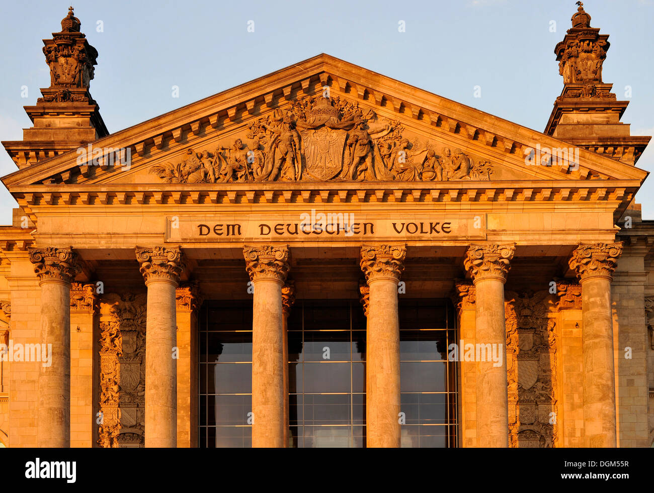Evening light on the Reichstag German Parliament, words "Dem Deutschen ...
