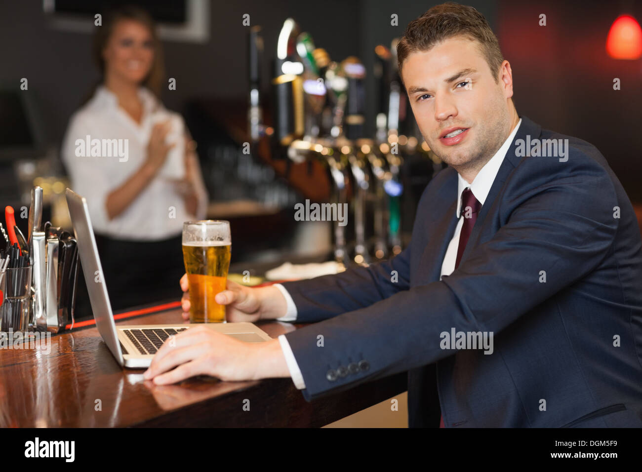 Man having pint bar using hi-res stock photography and images - Alamy
