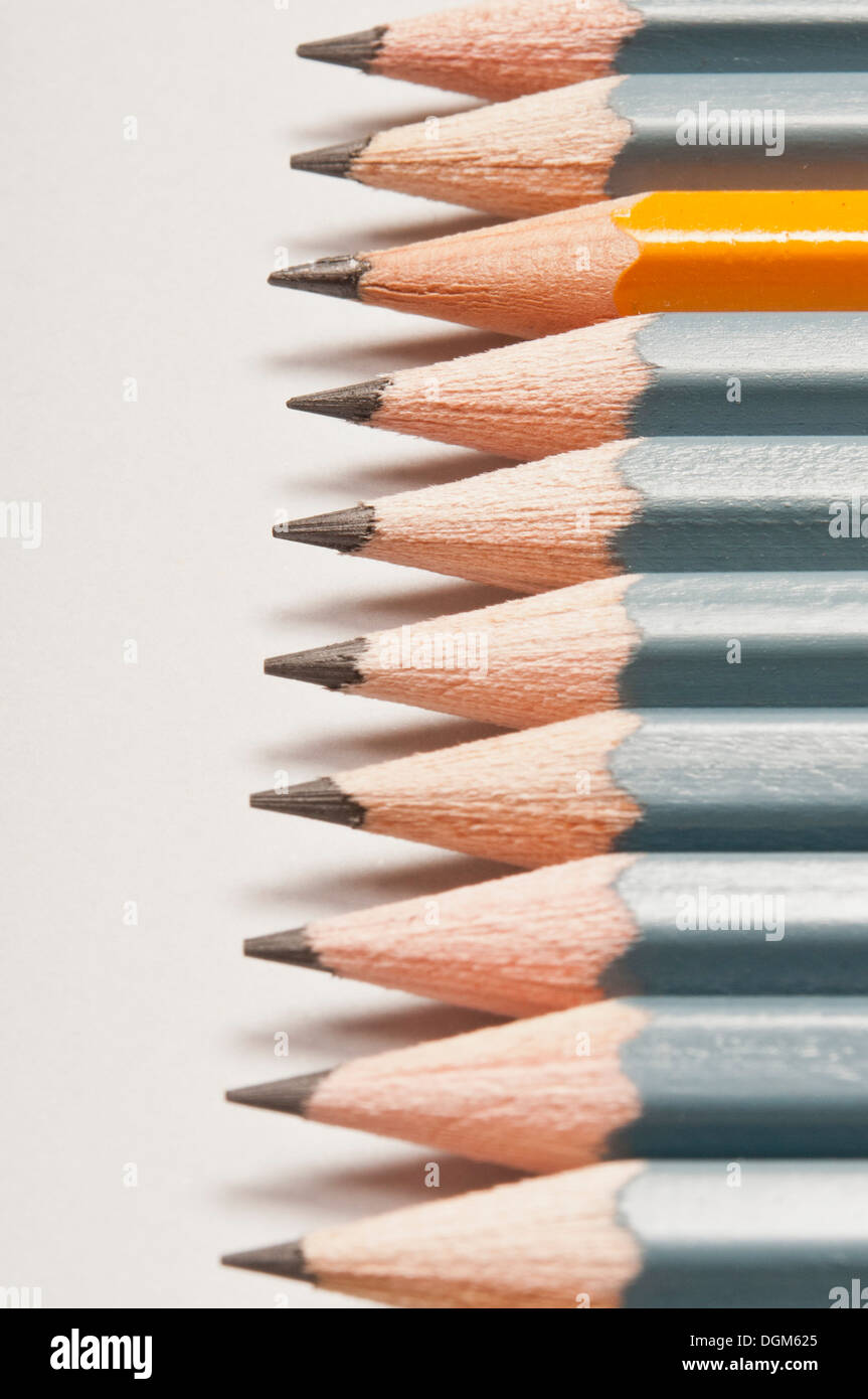 pencils row with one of different color Stock Photo - Alamy